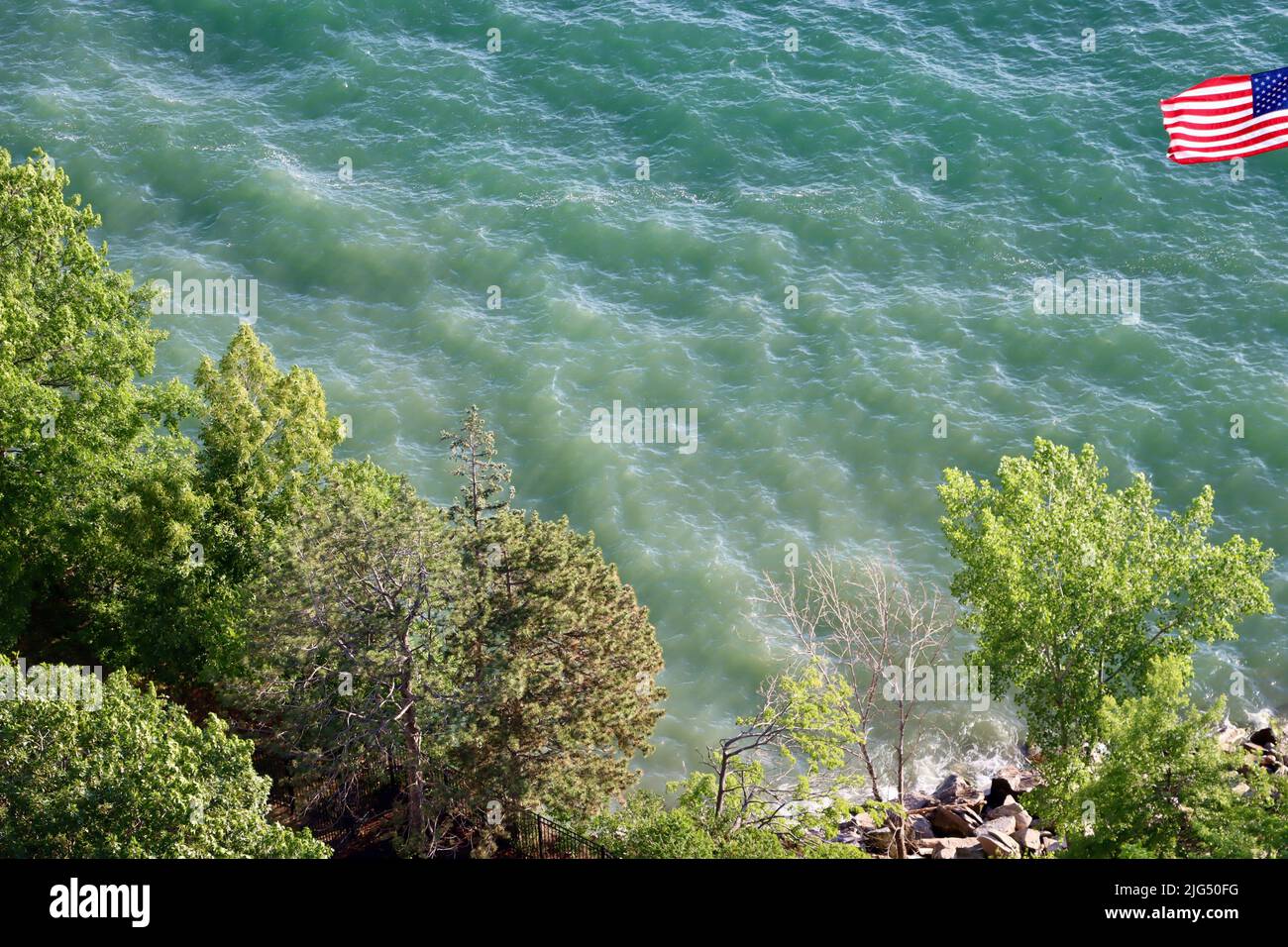 Trees and lonely flag on the shore of Lake Erie in Lakewood Ohio Stock ...