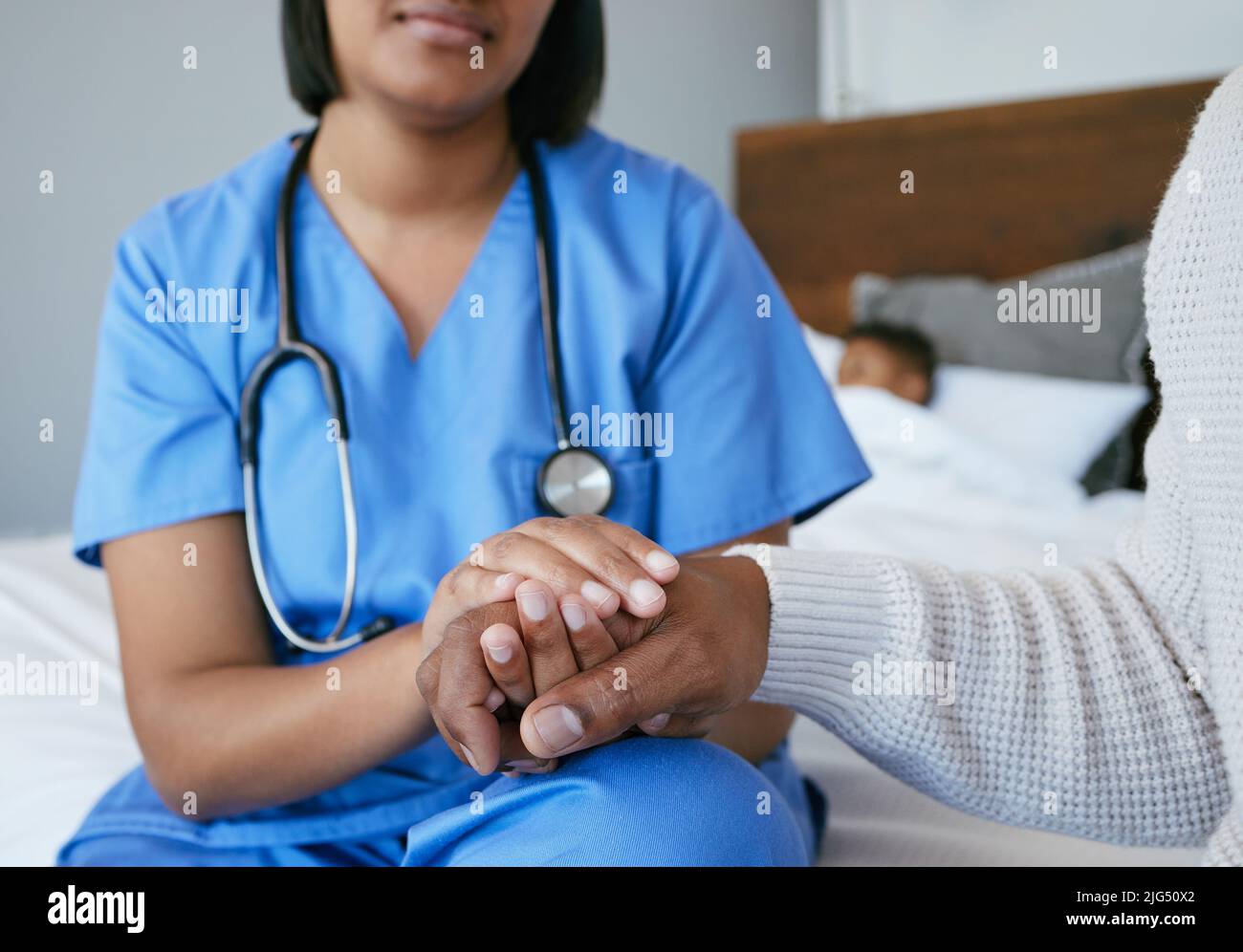 Im here to help you through this. Shot of a nurse comforting a man at ...