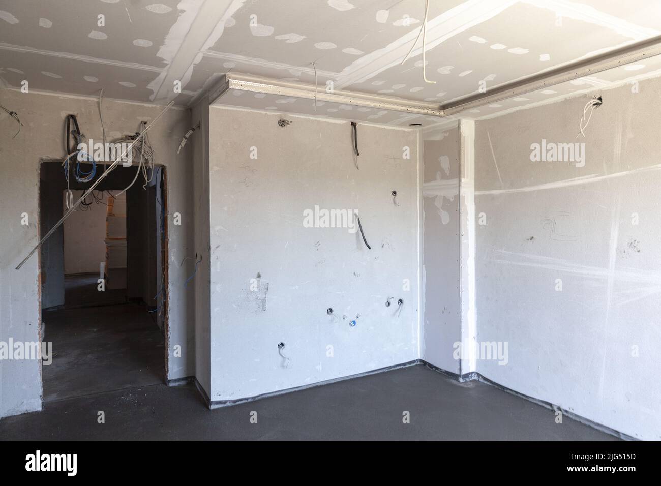 room under construction, with electrical instalation Stock Photo - Alamy