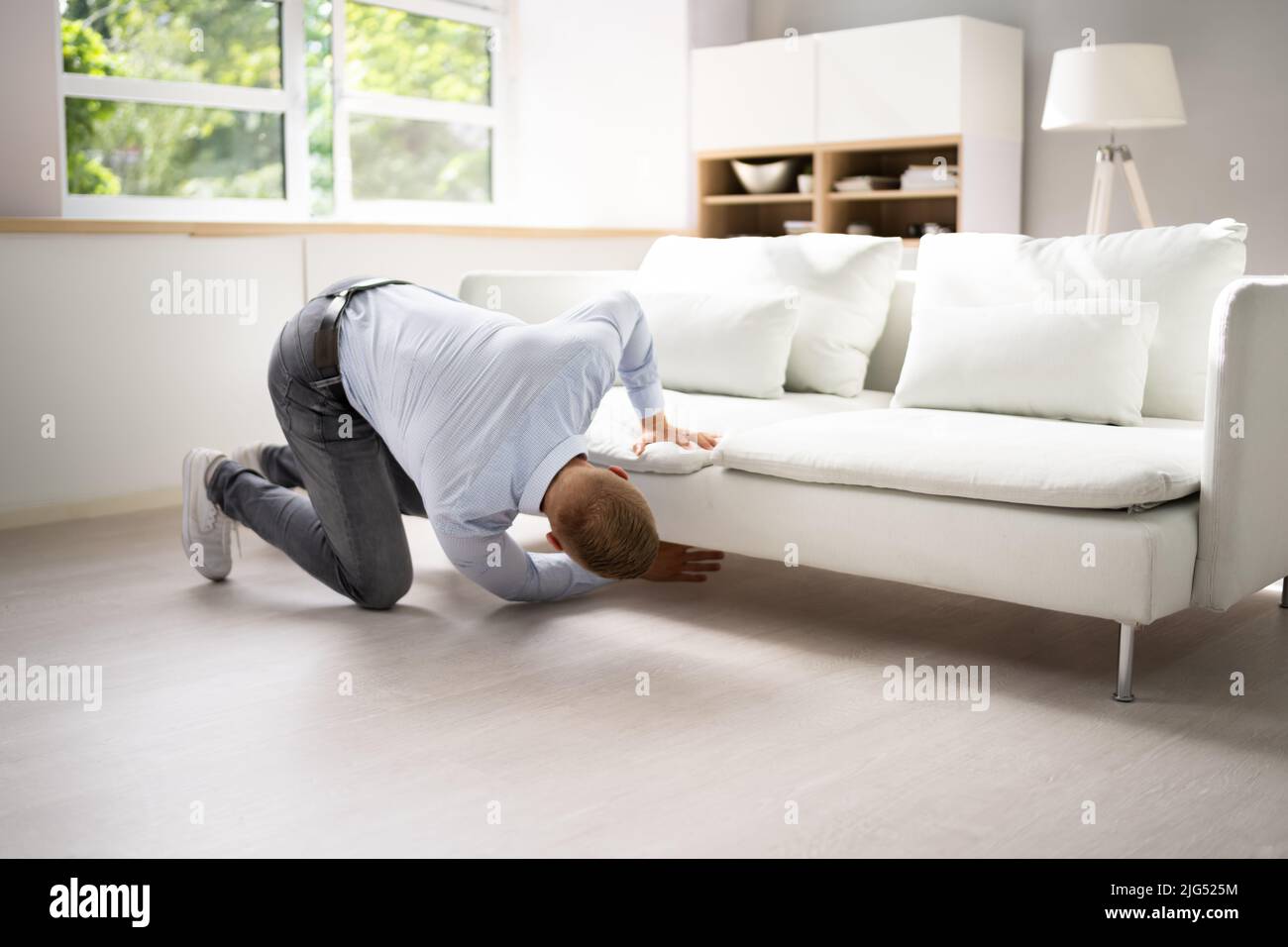 Hand dropping something hi-res stock photography and images - Alamy