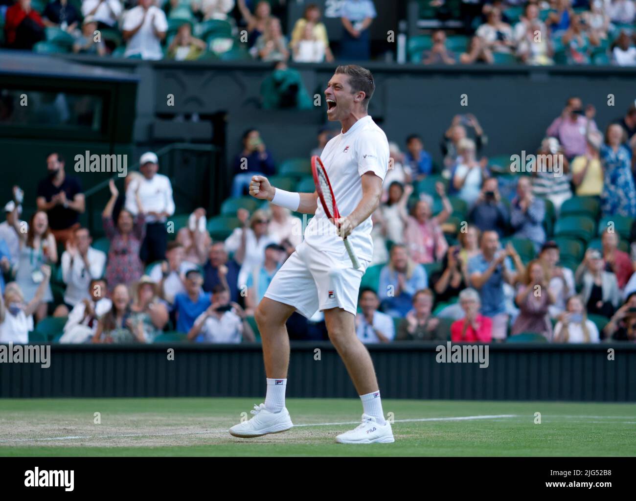 Neal Skupsk celebrates after winning his match with Desirae Krawczyk ...
