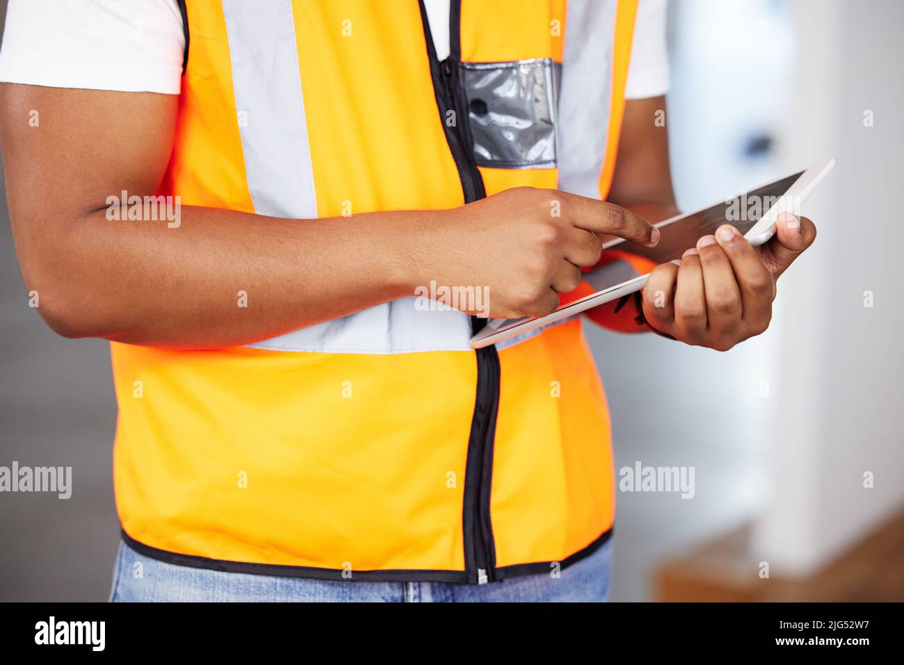 A quick check on our progress. Cropped shot of an unrecognizable ...