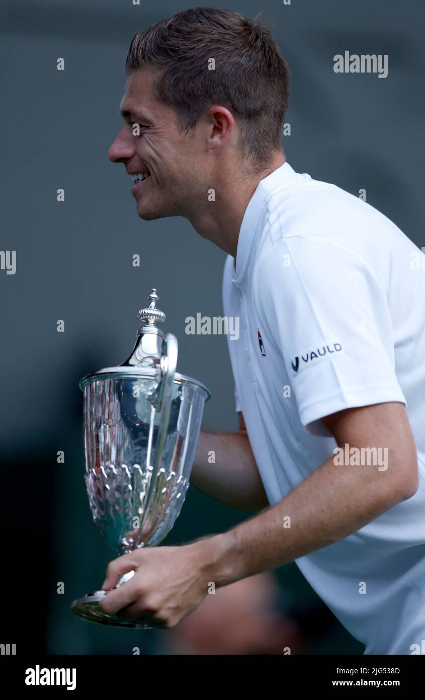 Neal Skupsk celebrates with his trophy after winning with team mate ...