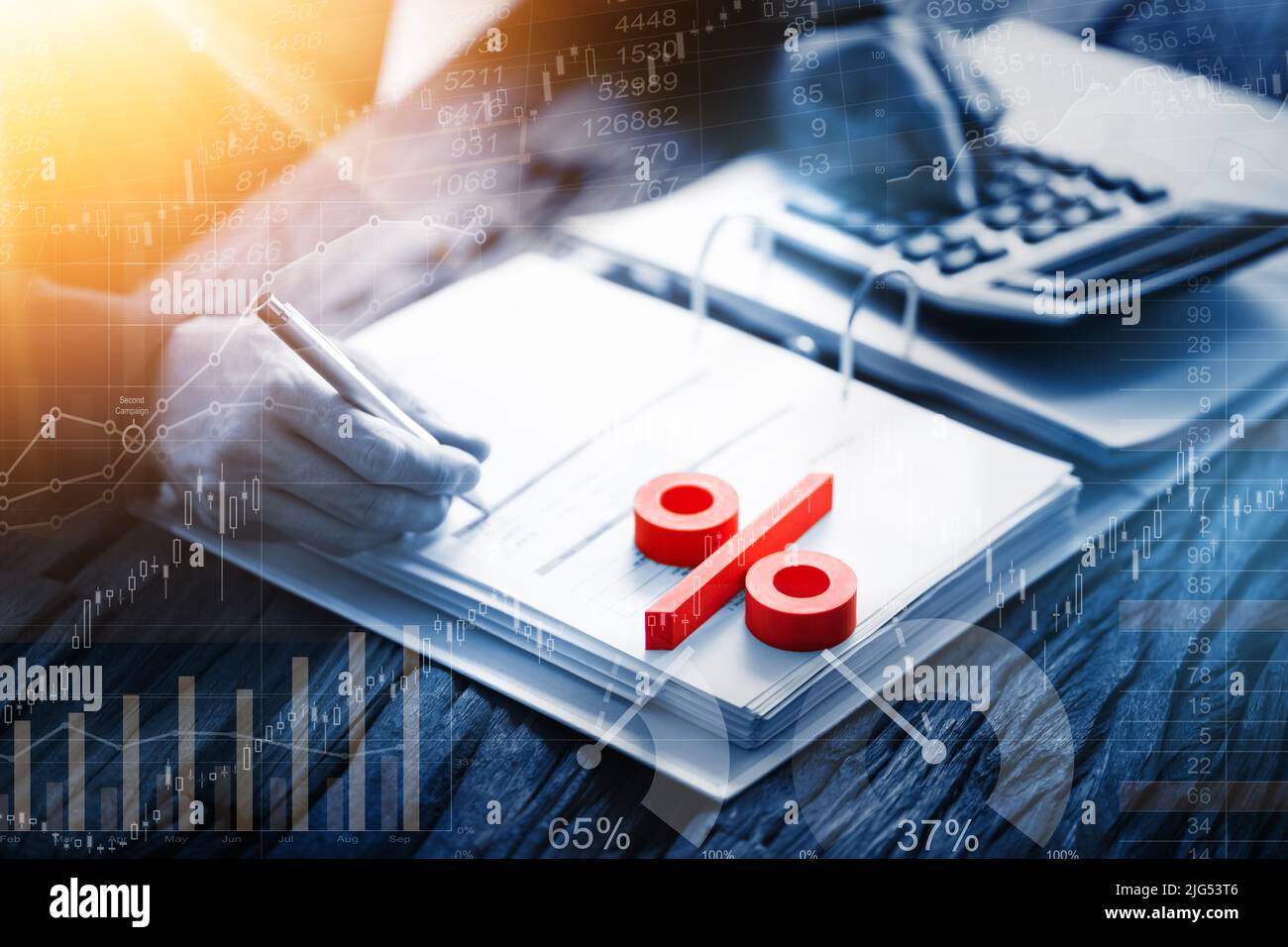 Close-up Of Red Percentage Symbol With Businessperson Calculating Bill ...