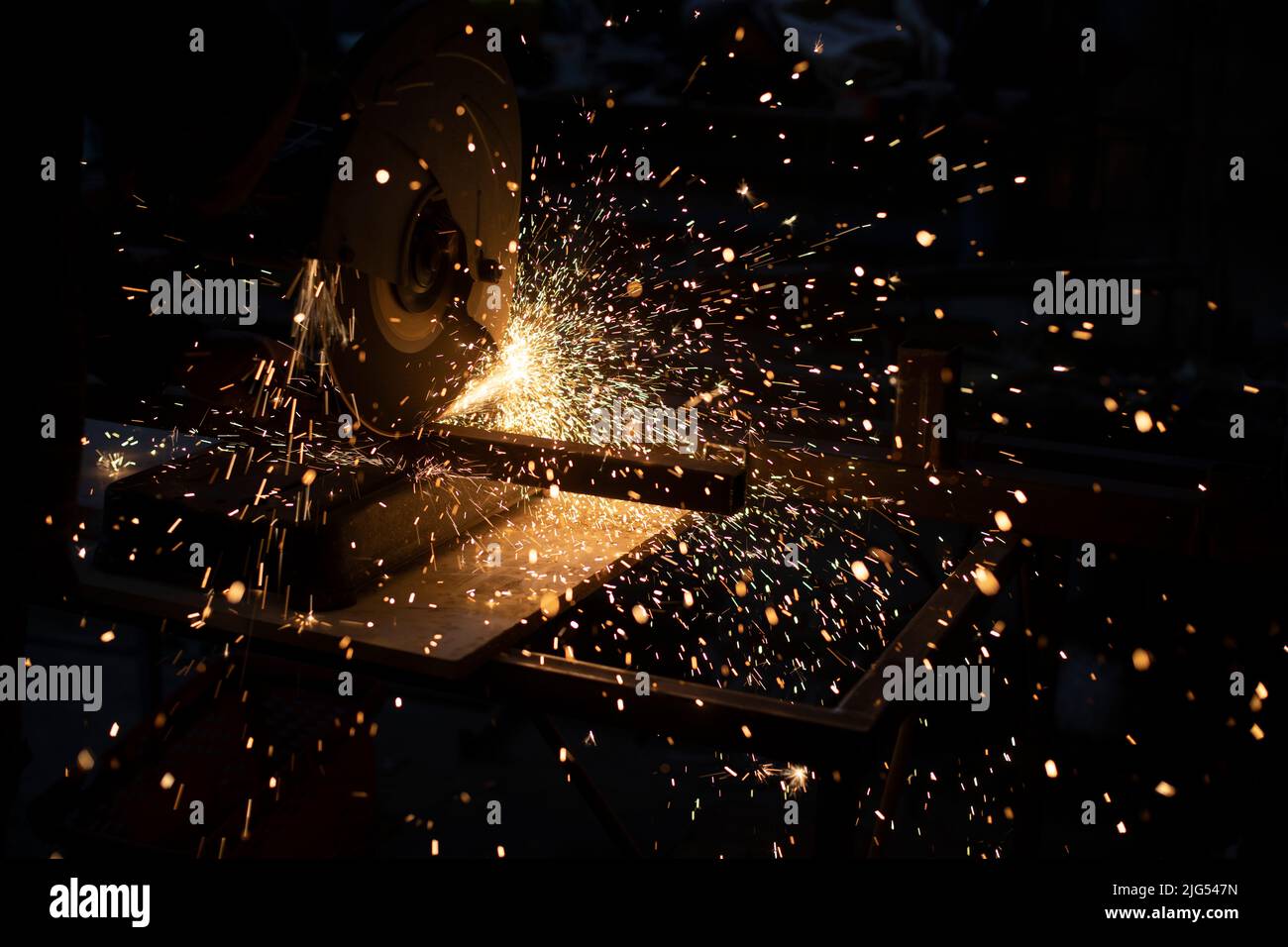 Sparks from metal. Lots of sparks from grinding steel. Circular saw ...