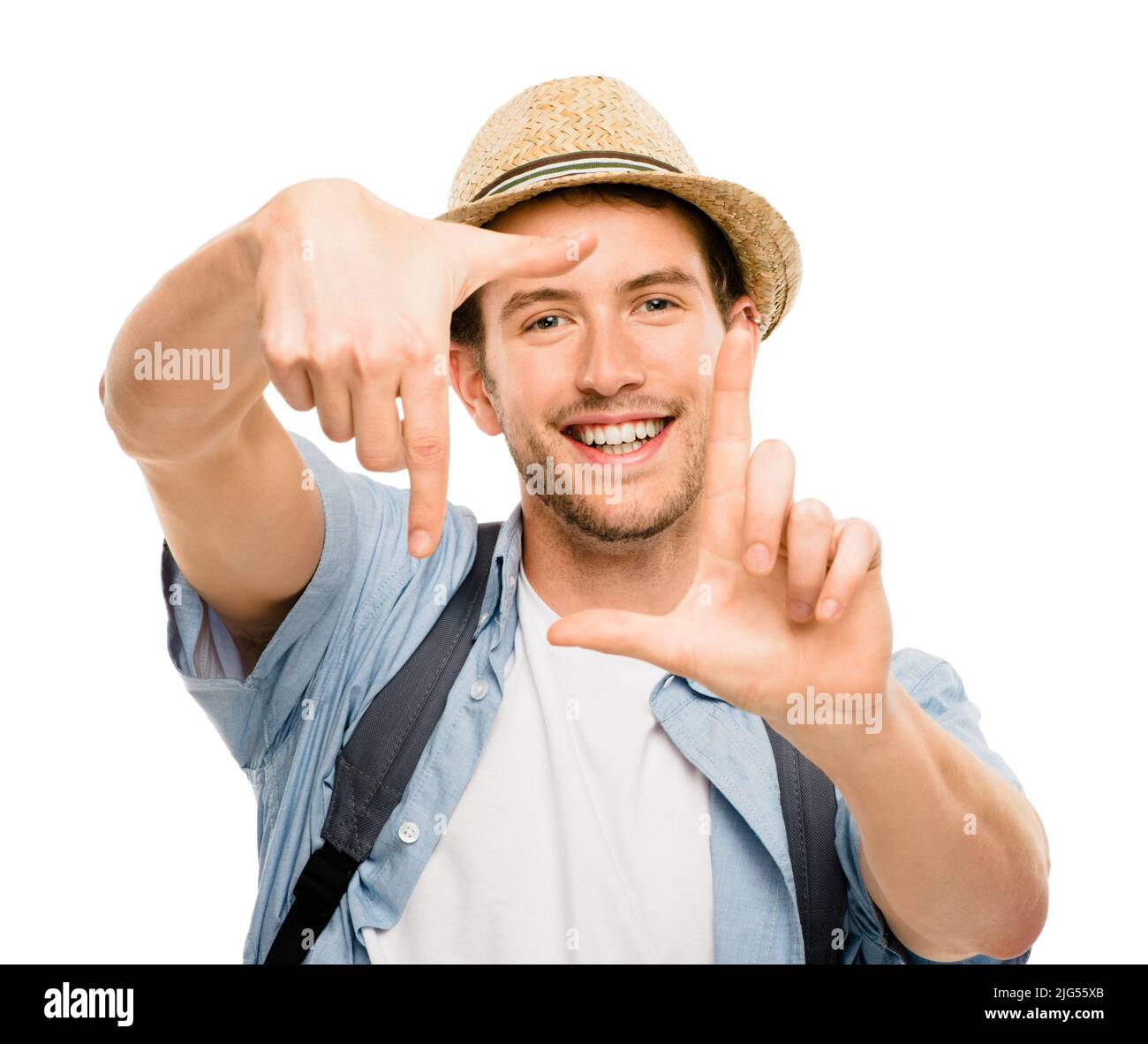 Framing up his gorgeous face. Shot of a young man framing his face ...