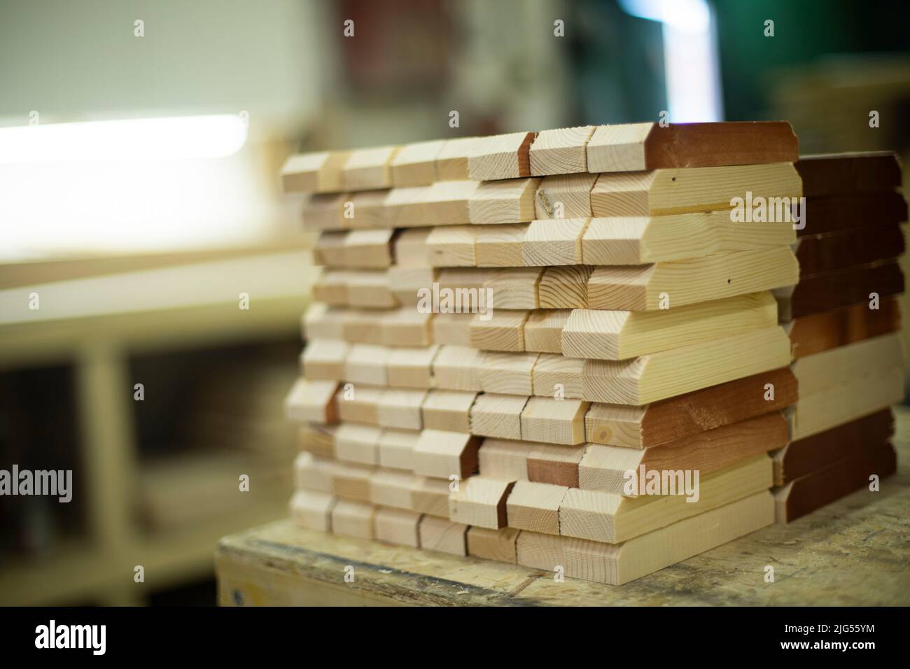 Details made of wood. Plaques on table. Building material in carpentry ...