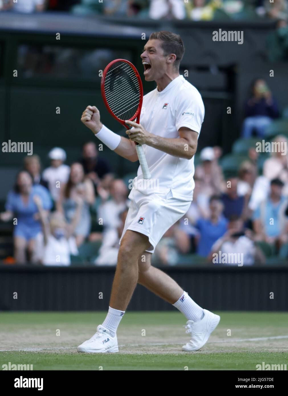 Neal Skupski celebrates after winning his match with Desirae Krawczyk ...