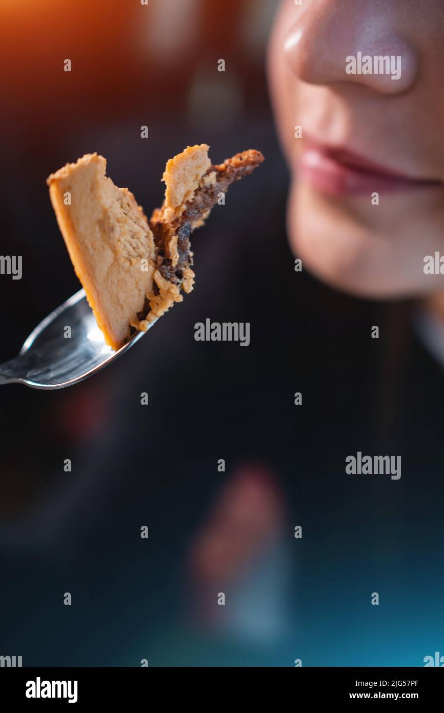 Person eating chocolate pie nut hi-res stock photography and images - Alamy