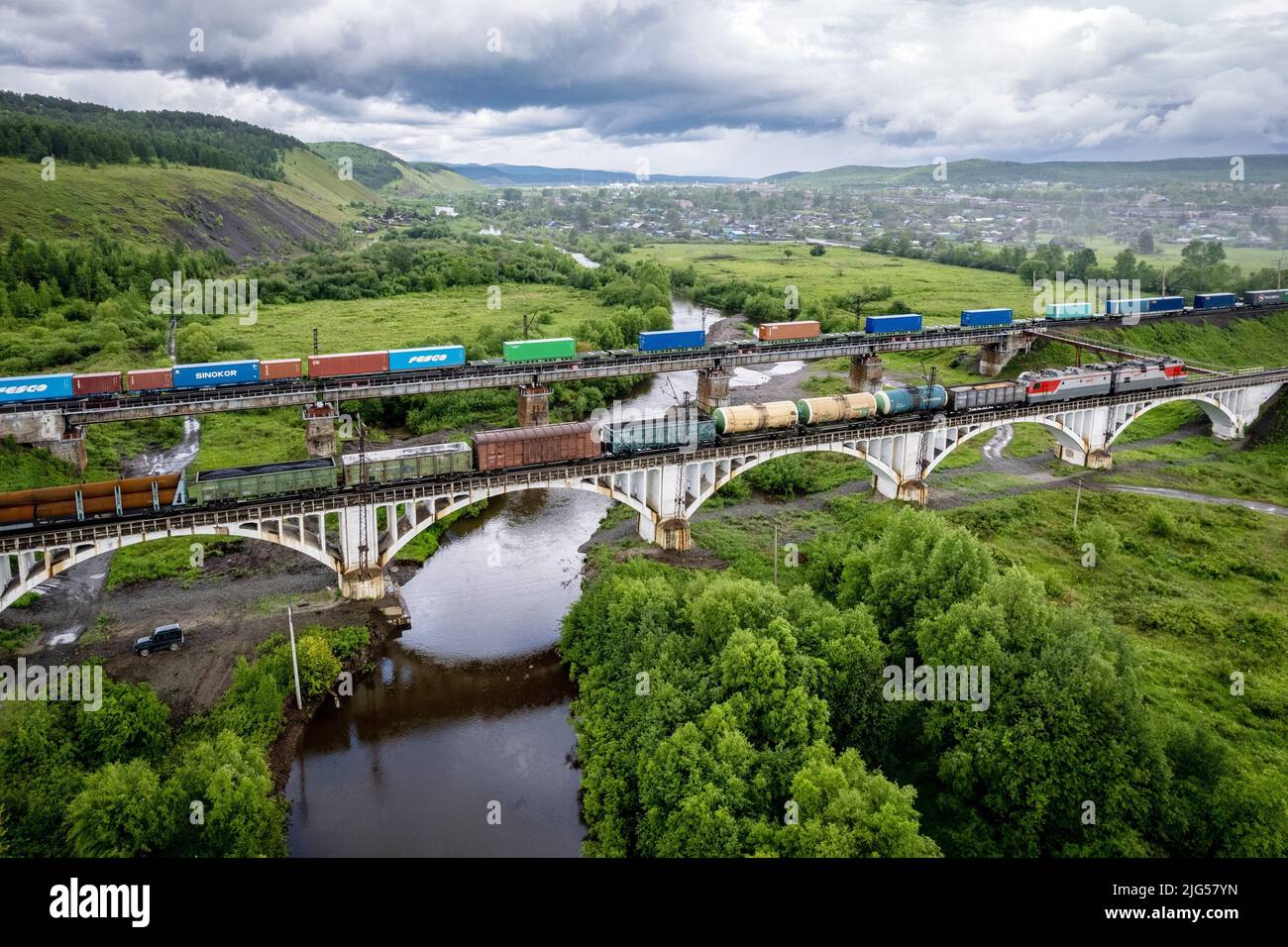 Views of the Amur region. Trans-Siberian Railway. Freight train near ...