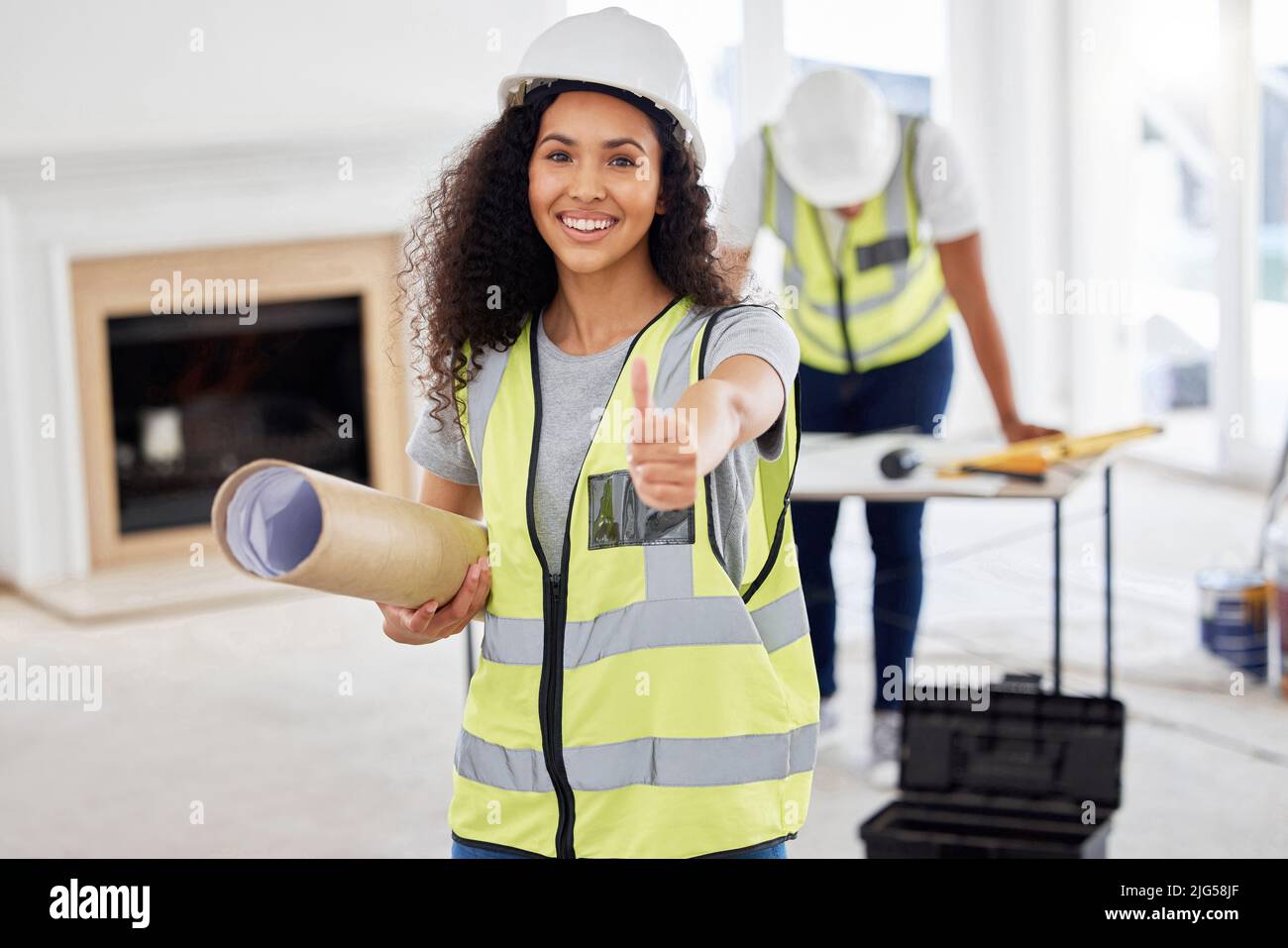 Your house will be ready soon. Shot of an attractive young contractor ...