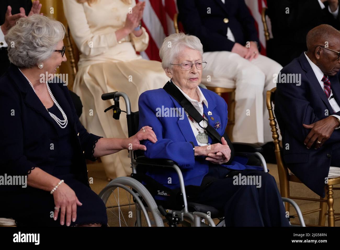 Brigadier General Wilma Vaught listens prior to accepting the Medal of ...