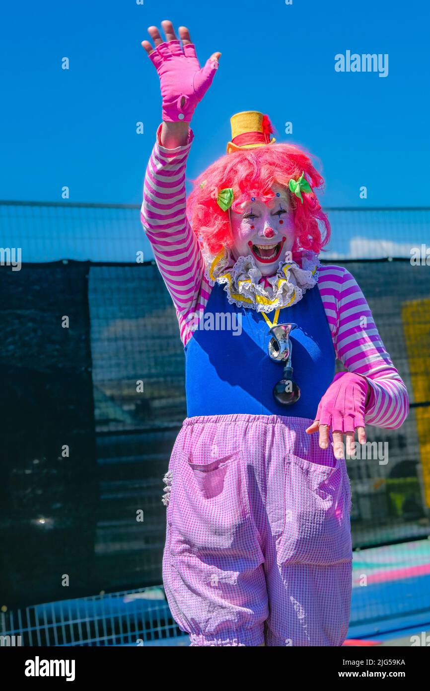 Tickles the Clown, waving hello Stock Photo - Alamy