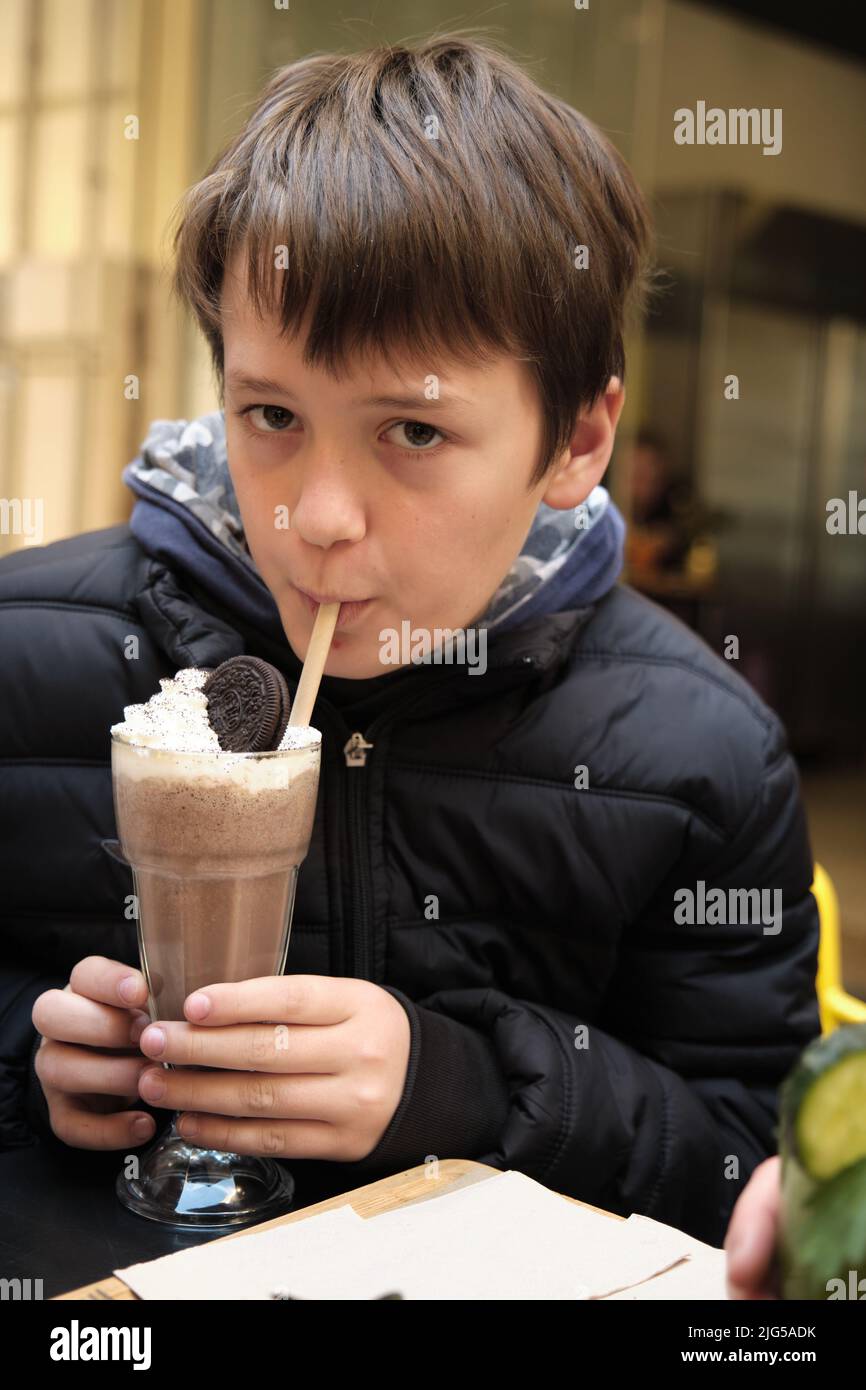 a boy with a milkshake Stock Photo - Alamy