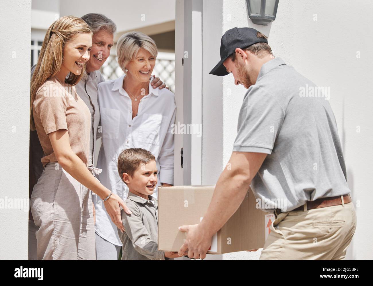 Boy with package hi-res stock photography and images - Alamy