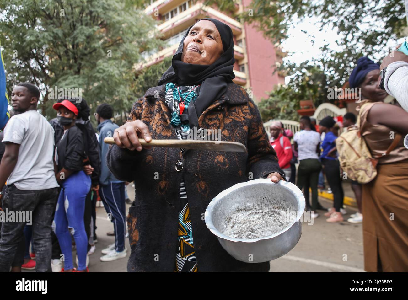 Nairobi, Kenya. 07th July, 2022. A Kenyan woman displays an empty ...