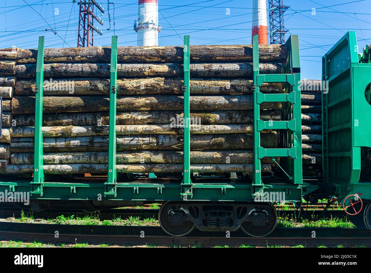 loaded railway wagons for transportation of logs close-up Stock Photo ...