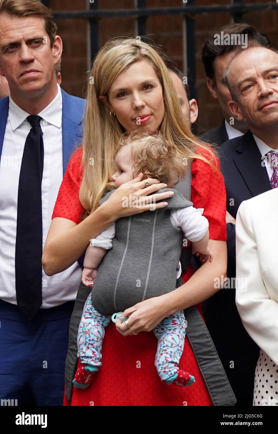 Carrie Johnson, the wife of Prime Minister Boris Johnson, cradles their ...