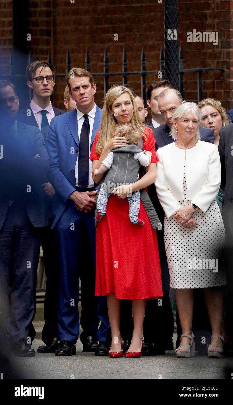 Carrie Johnson, the wife of Prime Minister Boris Johnson, cradles their ...