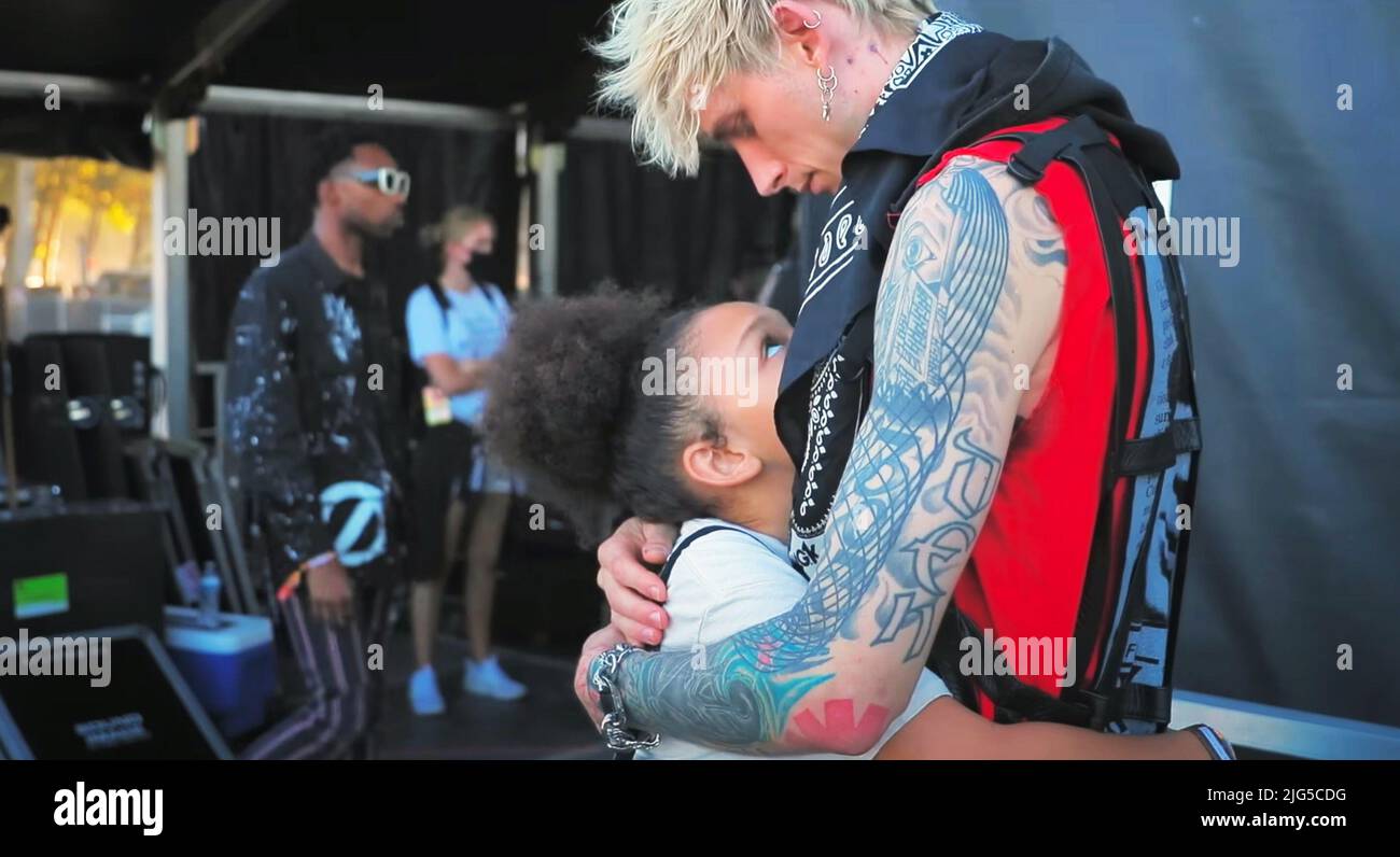 MACHINE GUN KELLY'S LIFE IN PINK, Machine Gun Kelly hugging his ...