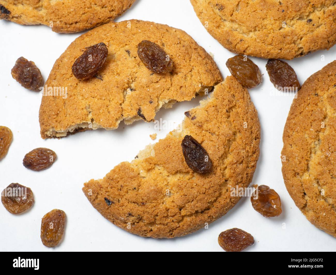 Oatmeal raisin cookies on a white background. Sweets. Broken tea ...