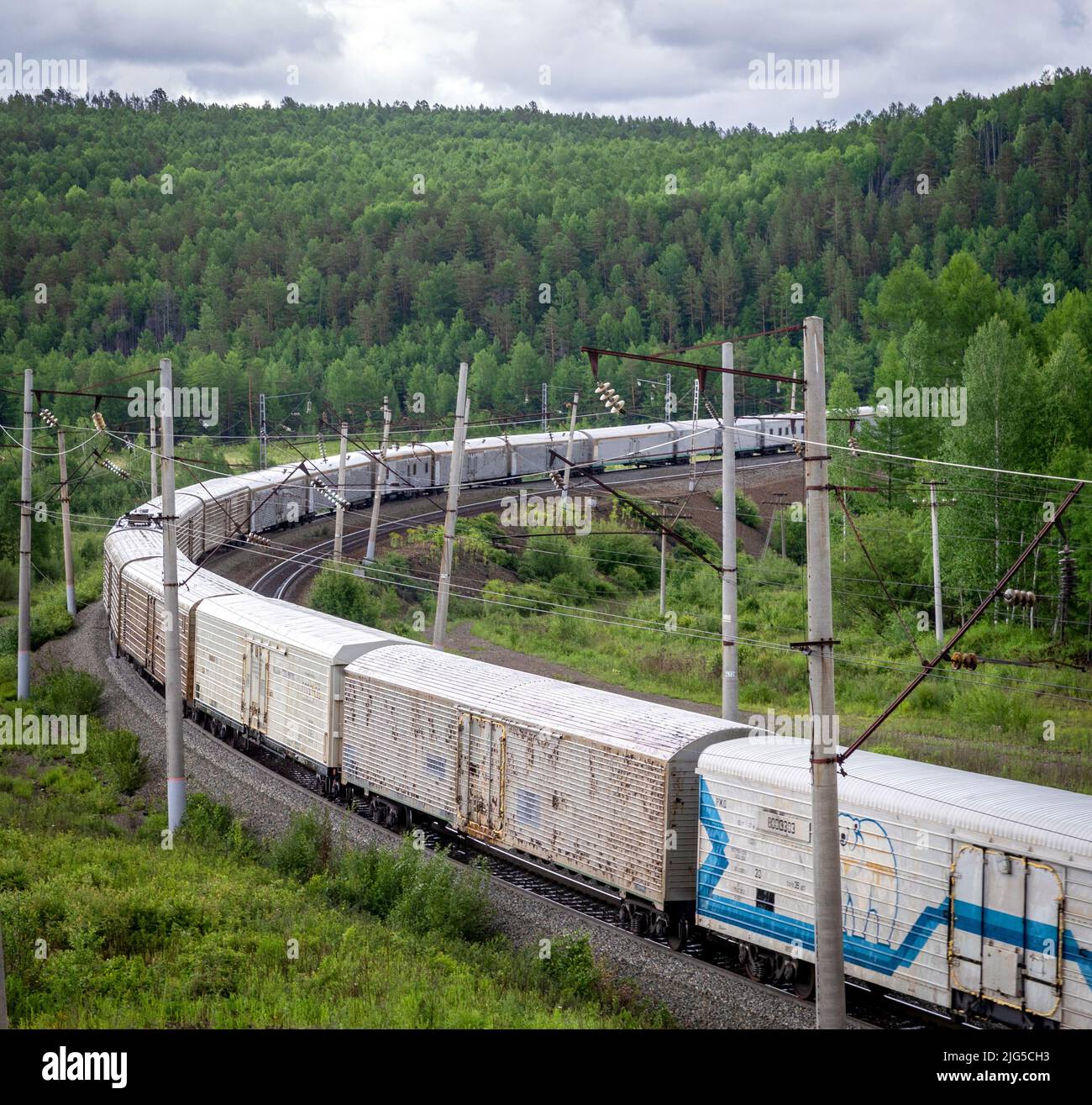 Views of the Amur region. Trans-Siberian Railway. Freight train near ...