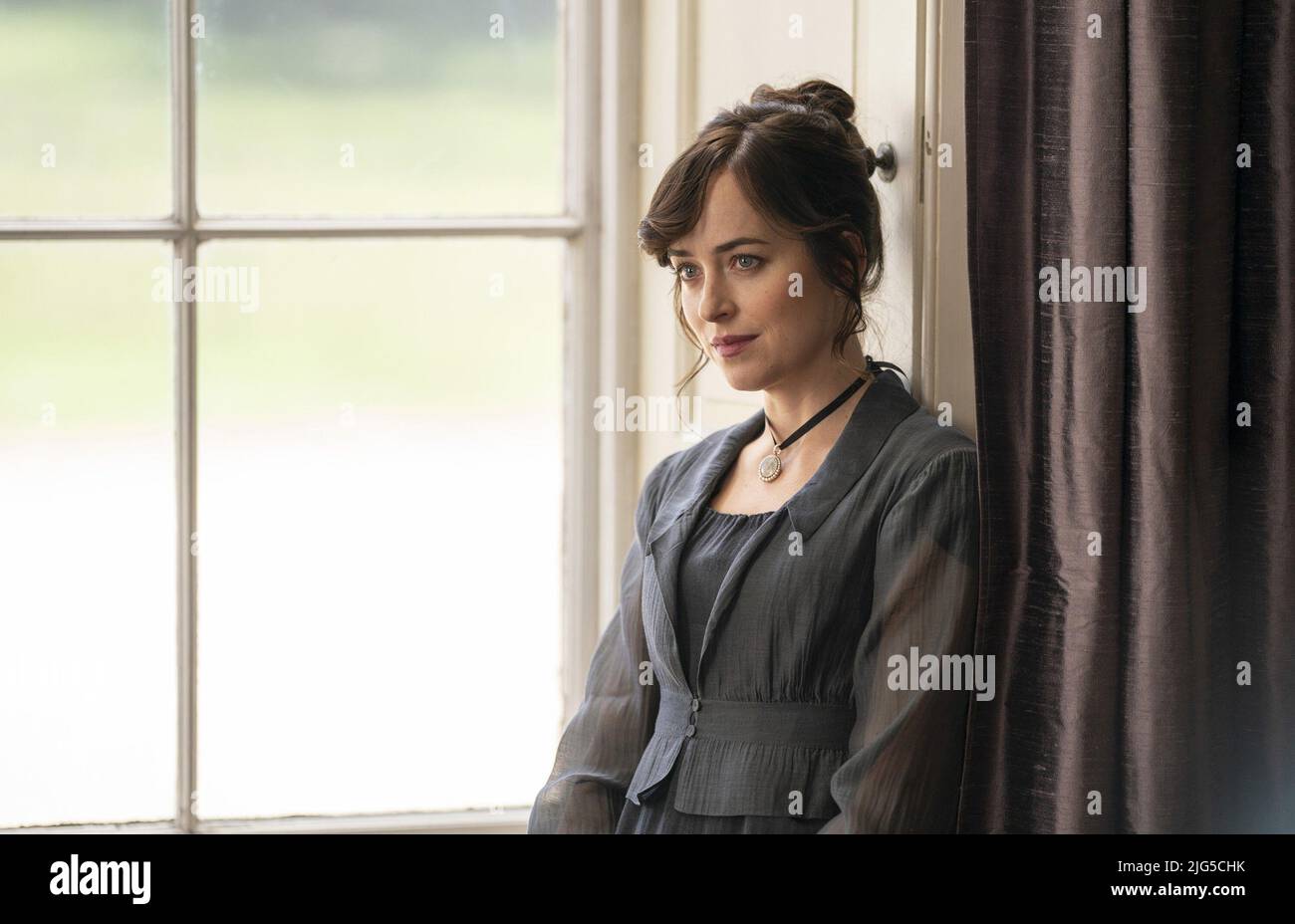 PERSUASION, Dakota Johnson as Anne Elliot, 2022. ph: Nick Wall ...