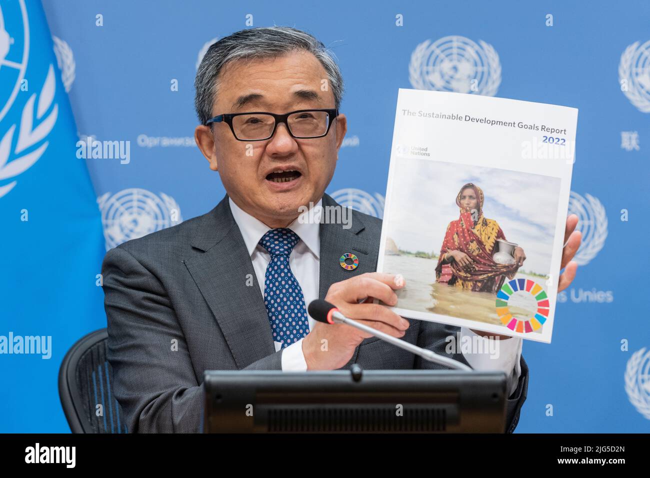 New York, NY - July 7, 2022: Liu Zhenmin holds report during speech at ...