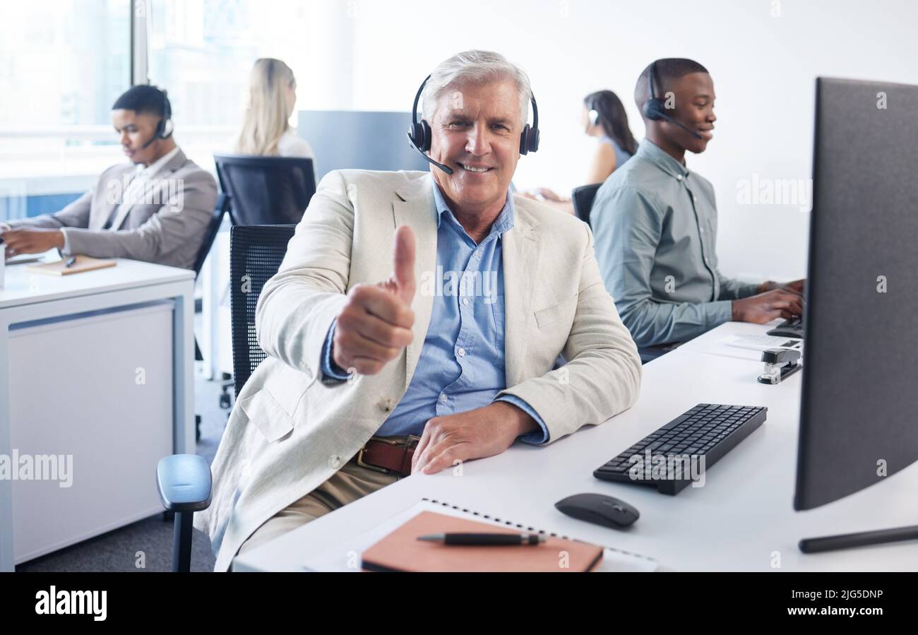 Call center office thumbs hi-res stock photography and images - Alamy