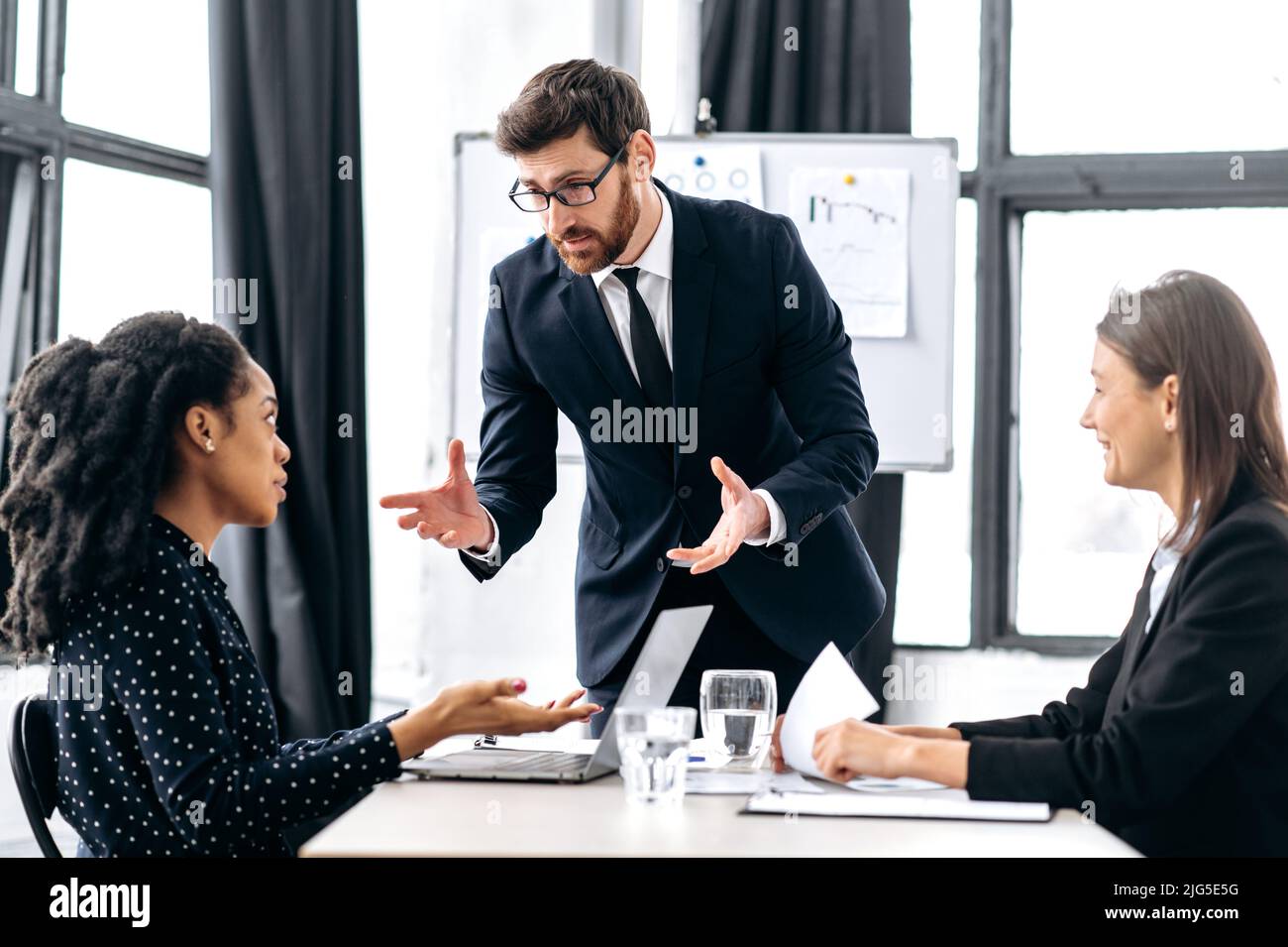 Teamwork, collaboration concept. Successful multiracial office ...