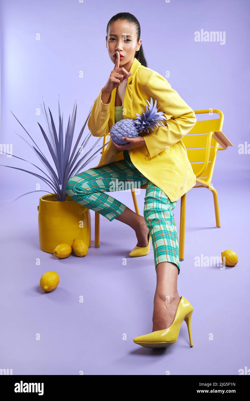 Feeling fruity. Full length studio portrait of an attractive young ...