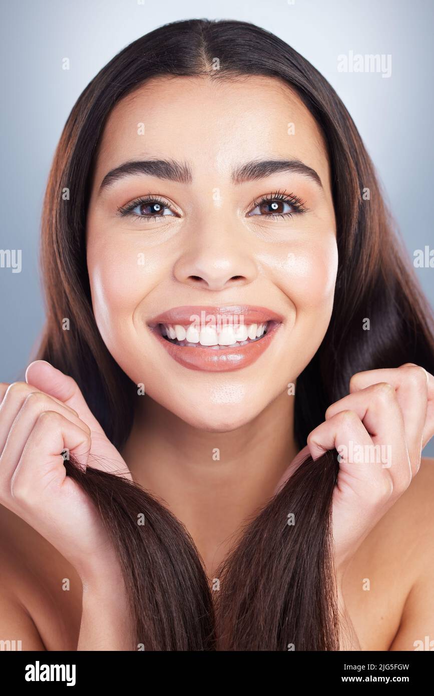 Close up portrait of a beautiful mixed race woman with clean skin and ...