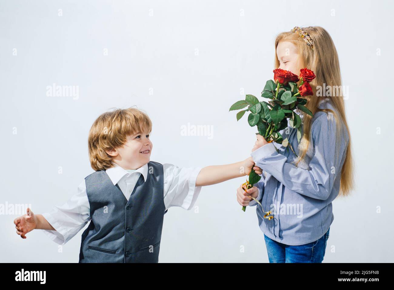 Little Boy with a rose for his teen girlfriend, romantic children ...