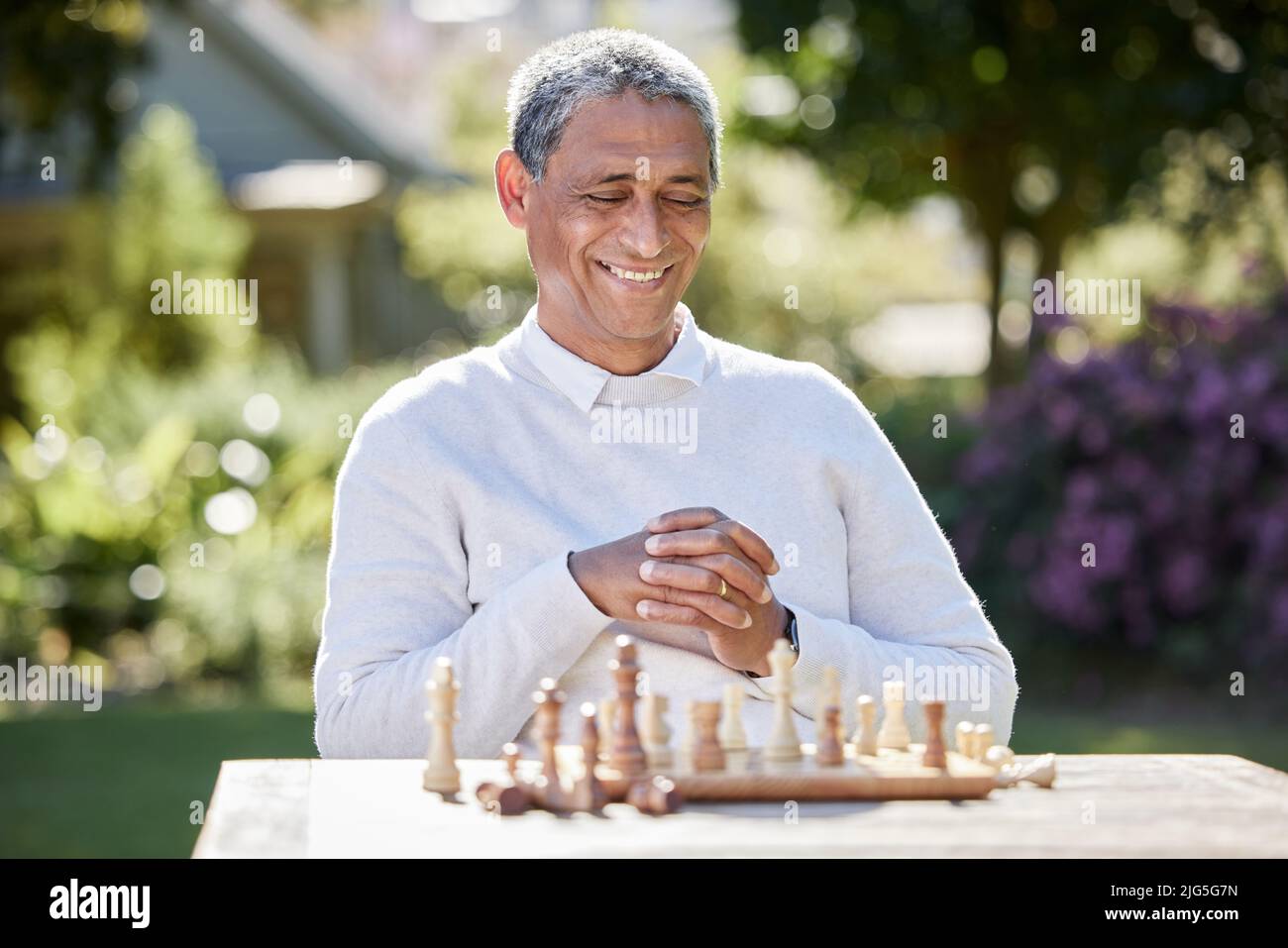 Old man playing chess alone hi-res stock photography and images - Alamy