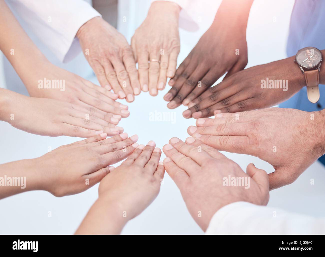 We can achieve anything together. Shot of a group of unrecognizable ...