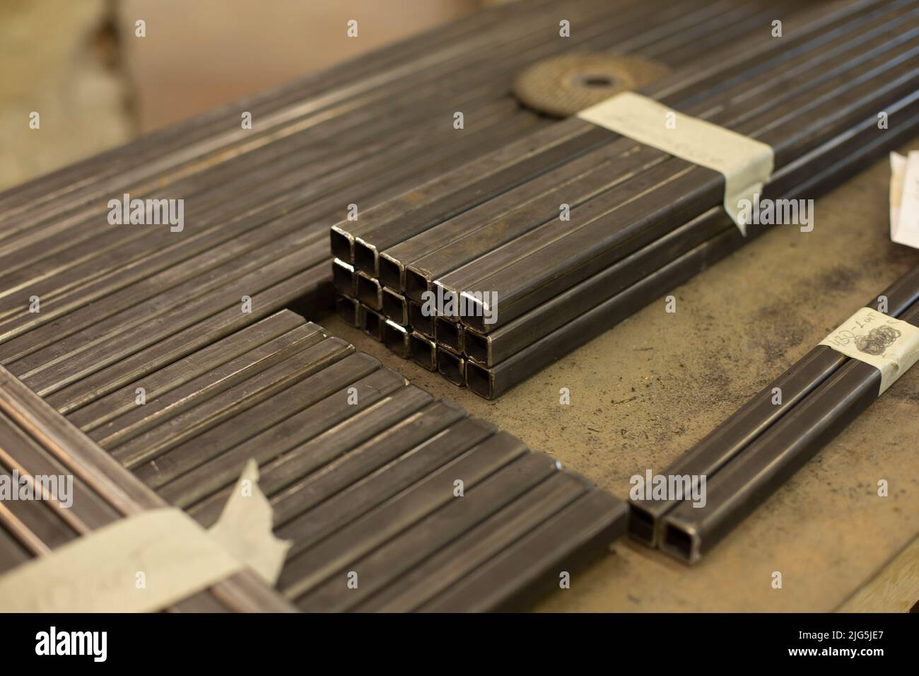 Steel profile in workshop. Rod made of metal. Steel part for ...