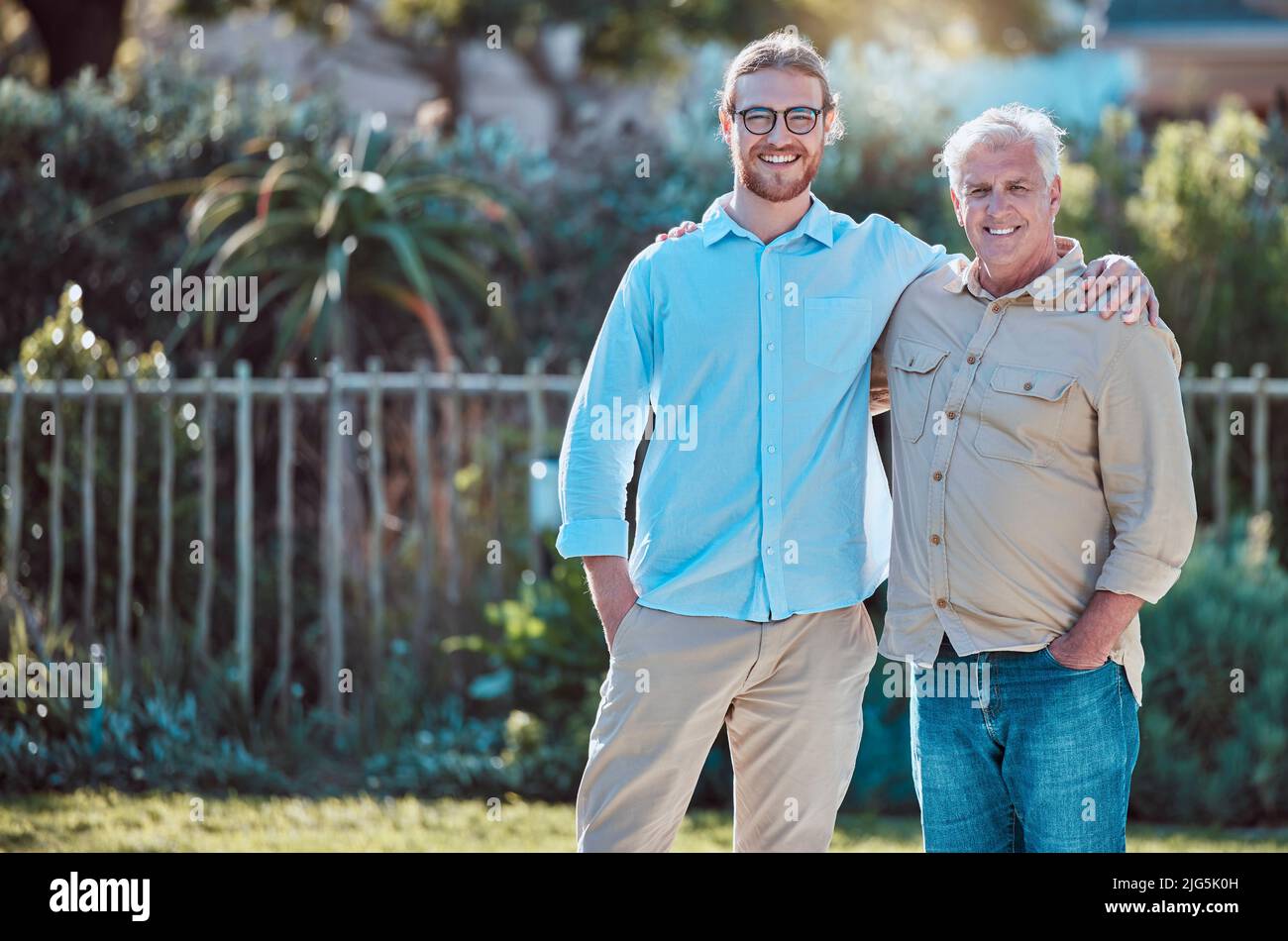 Never too old to ask dad. Shot of a father bonding with his son outside ...