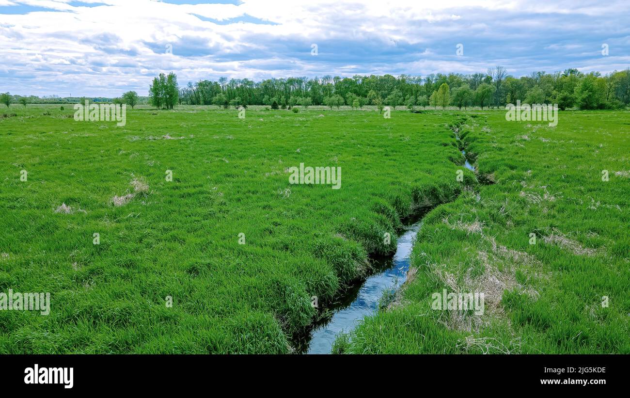 Stream field edge hi-res stock photography and images - Alamy