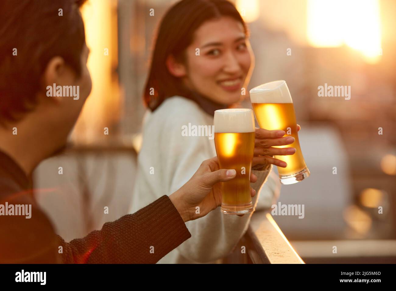 Japanese people having a drink outside Stock Photo - Alamy