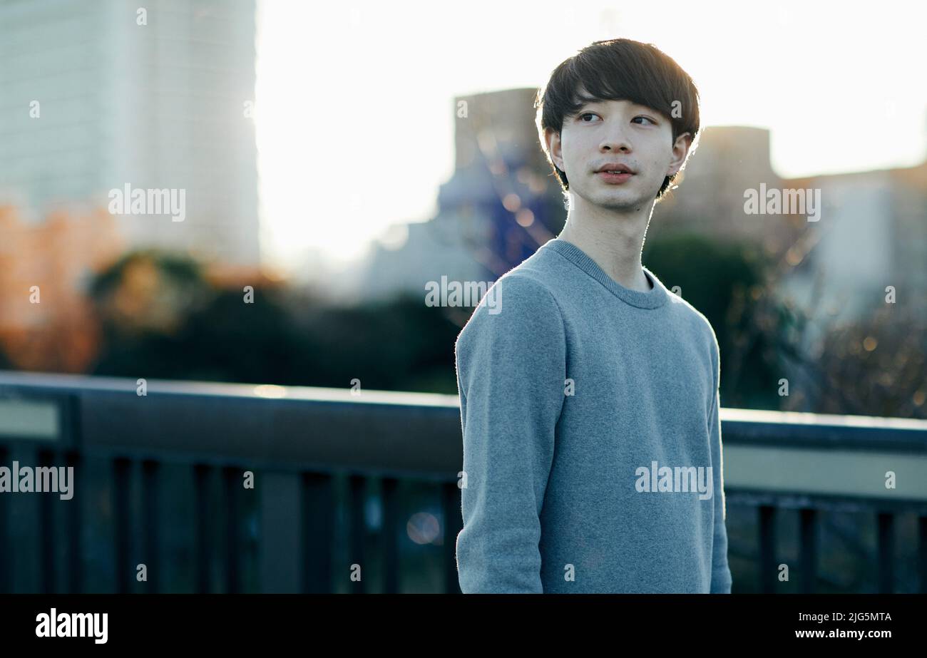 Portrait young asian man turning hi-res stock photography and images ...