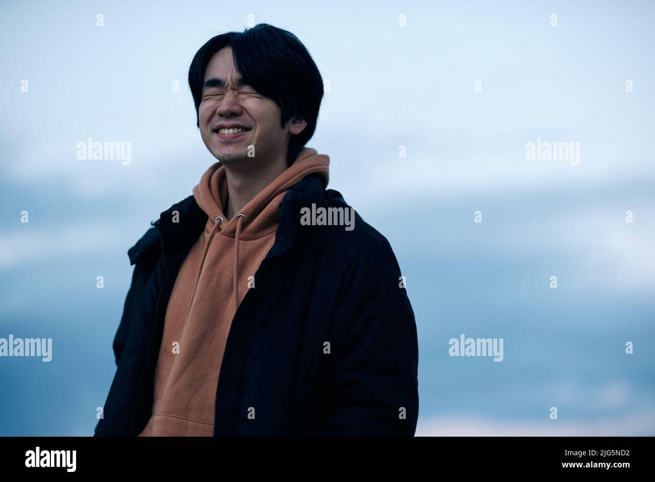 Asian man eyes shut portrait hi-res stock photography and images - Alamy