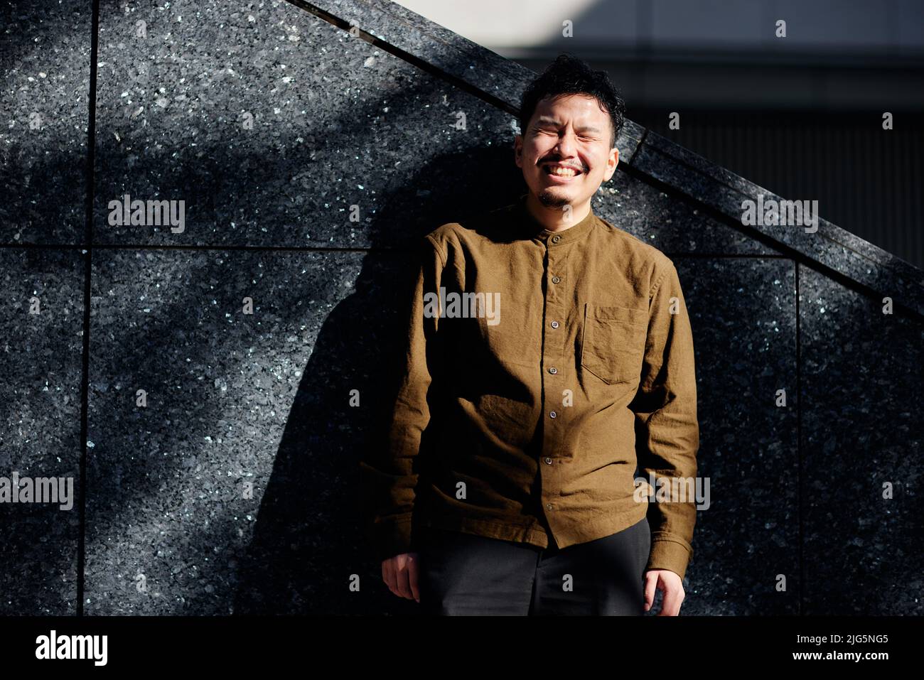 Asian man eyes shut portrait hi-res stock photography and images - Alamy