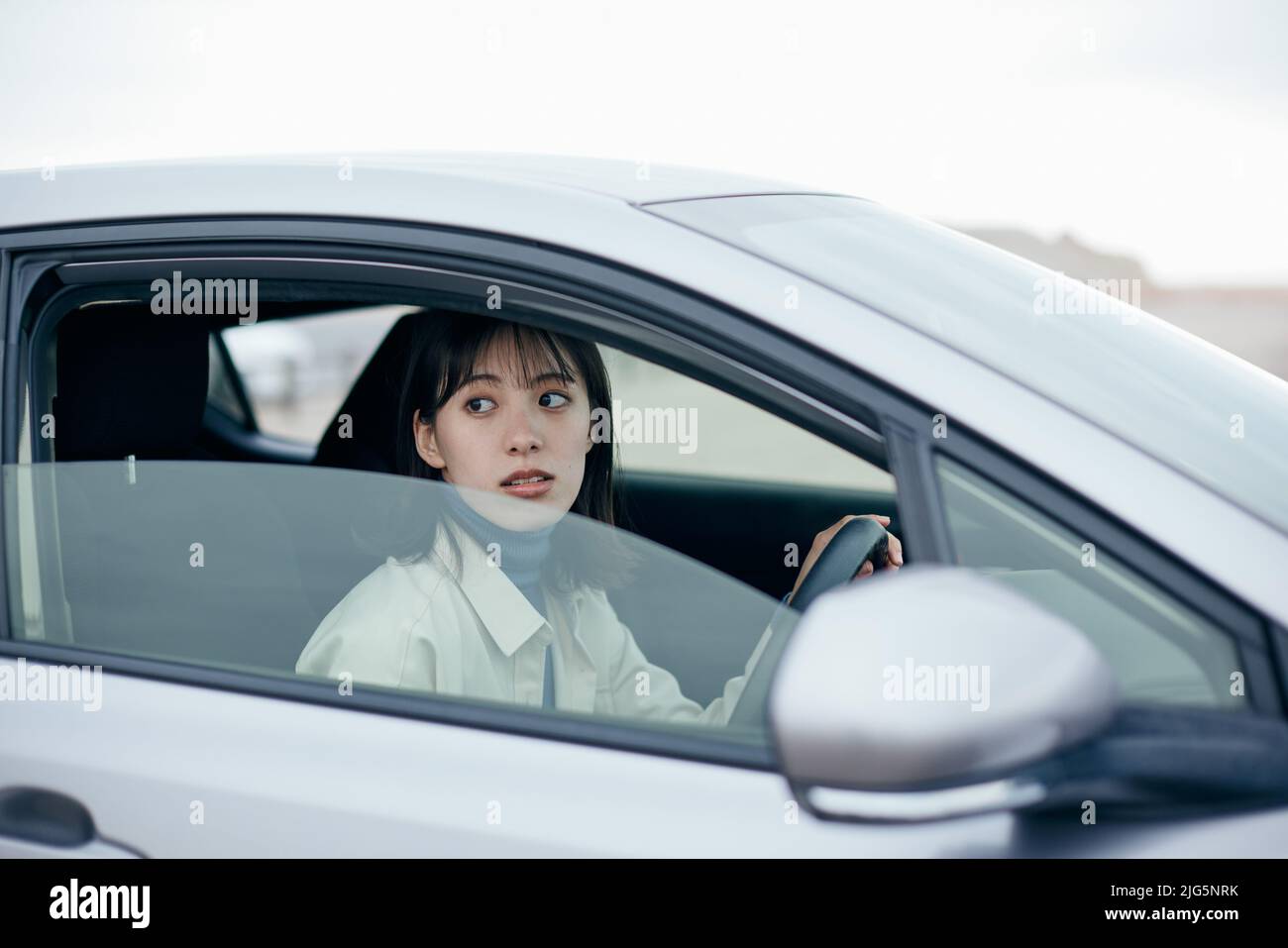 Japanese woman having a drive Stock Photo - Alamy
