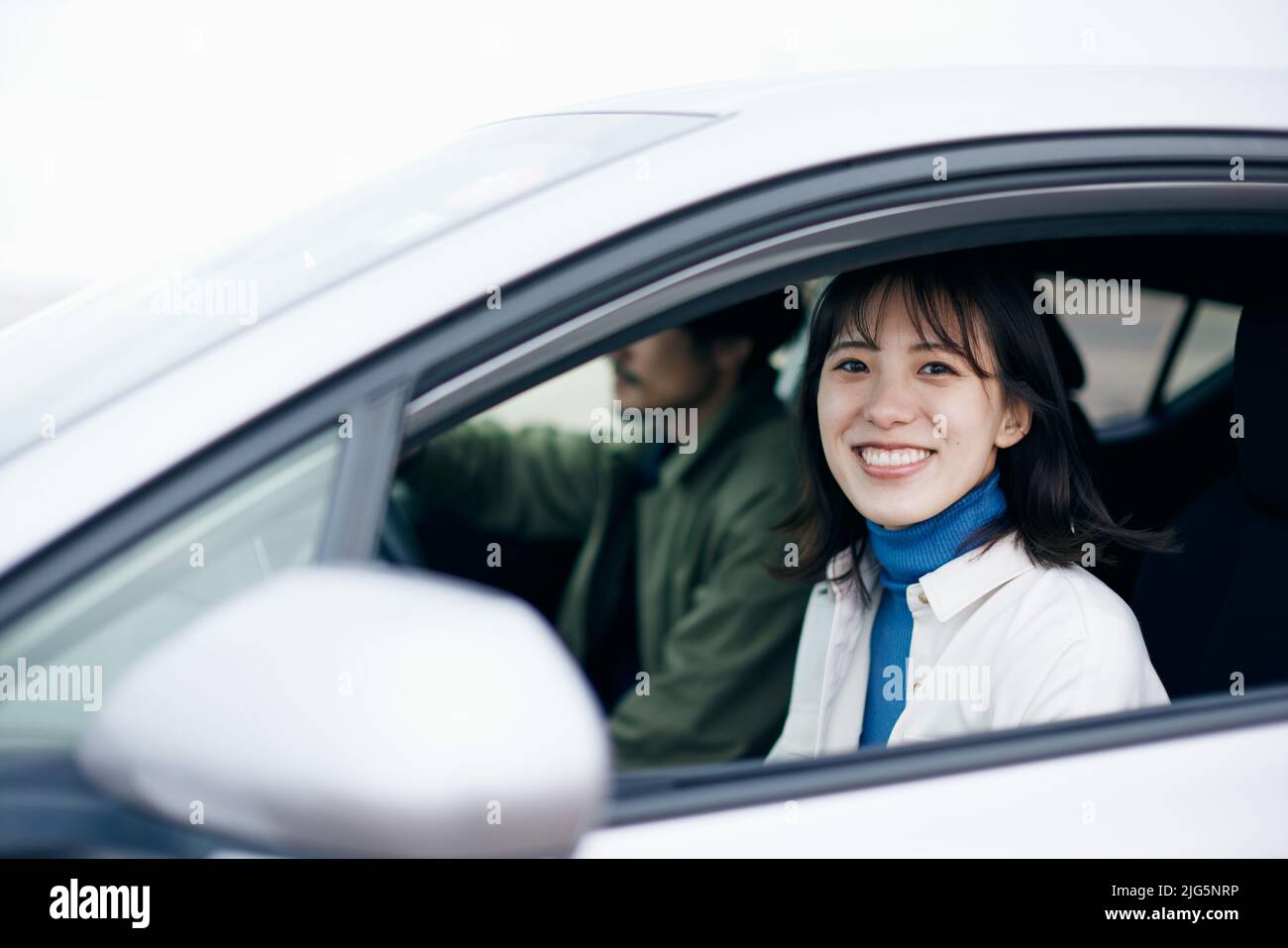 Japanese couple having a drive together Stock Photo - Alamy
