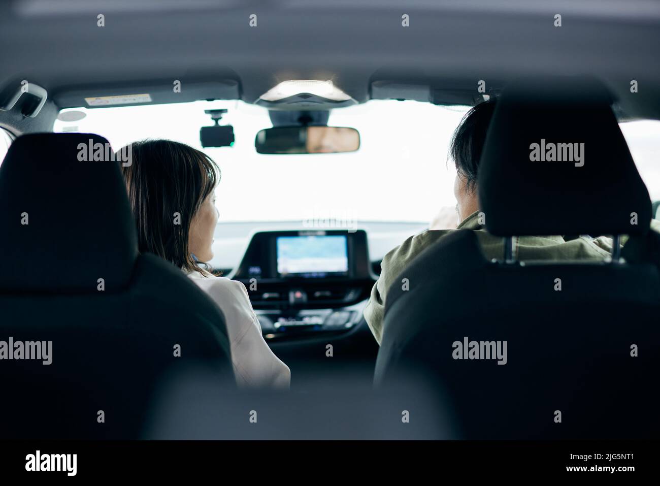 Japanese couple having a drive together Stock Photo - Alamy
