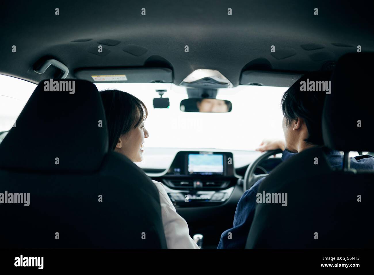 Japanese couple having a drive together Stock Photo - Alamy