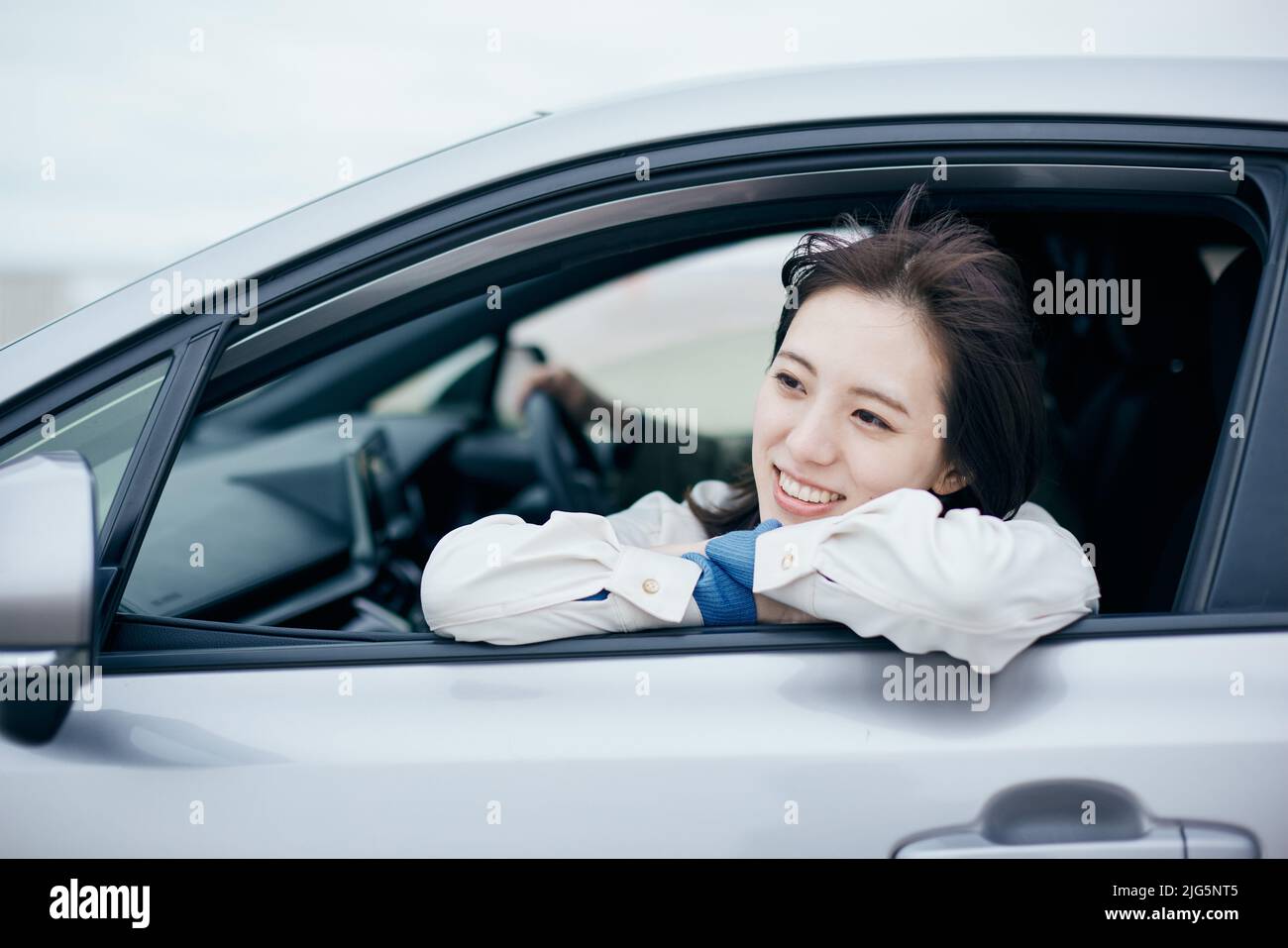 Japanese couple having a drive together Stock Photo - Alamy