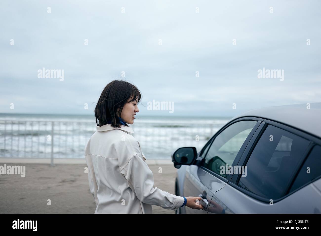 Japanese woman having a drive Stock Photo - Alamy