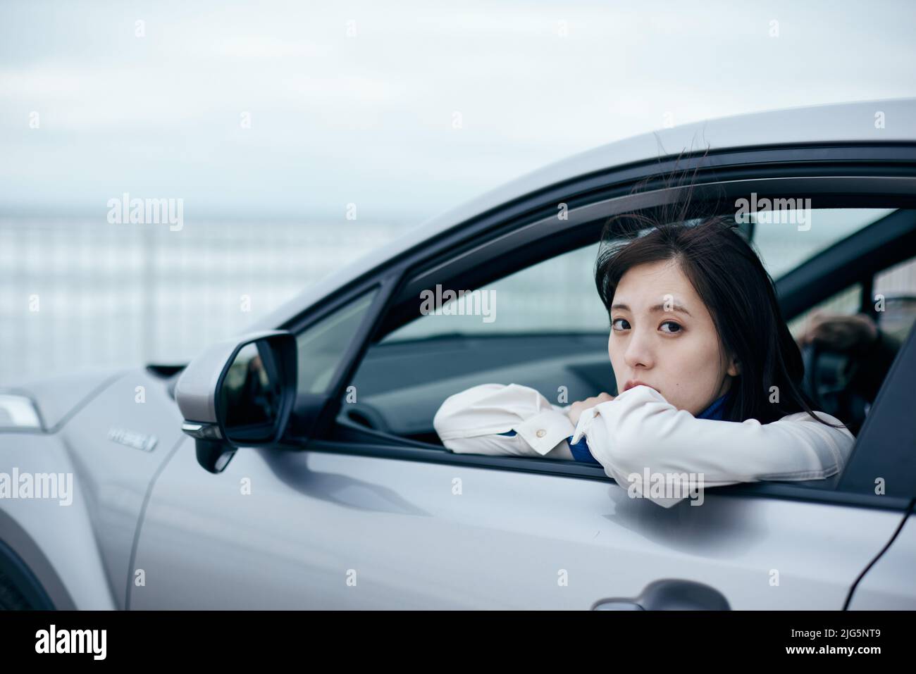 Japanese couple having a drive together Stock Photo - Alamy