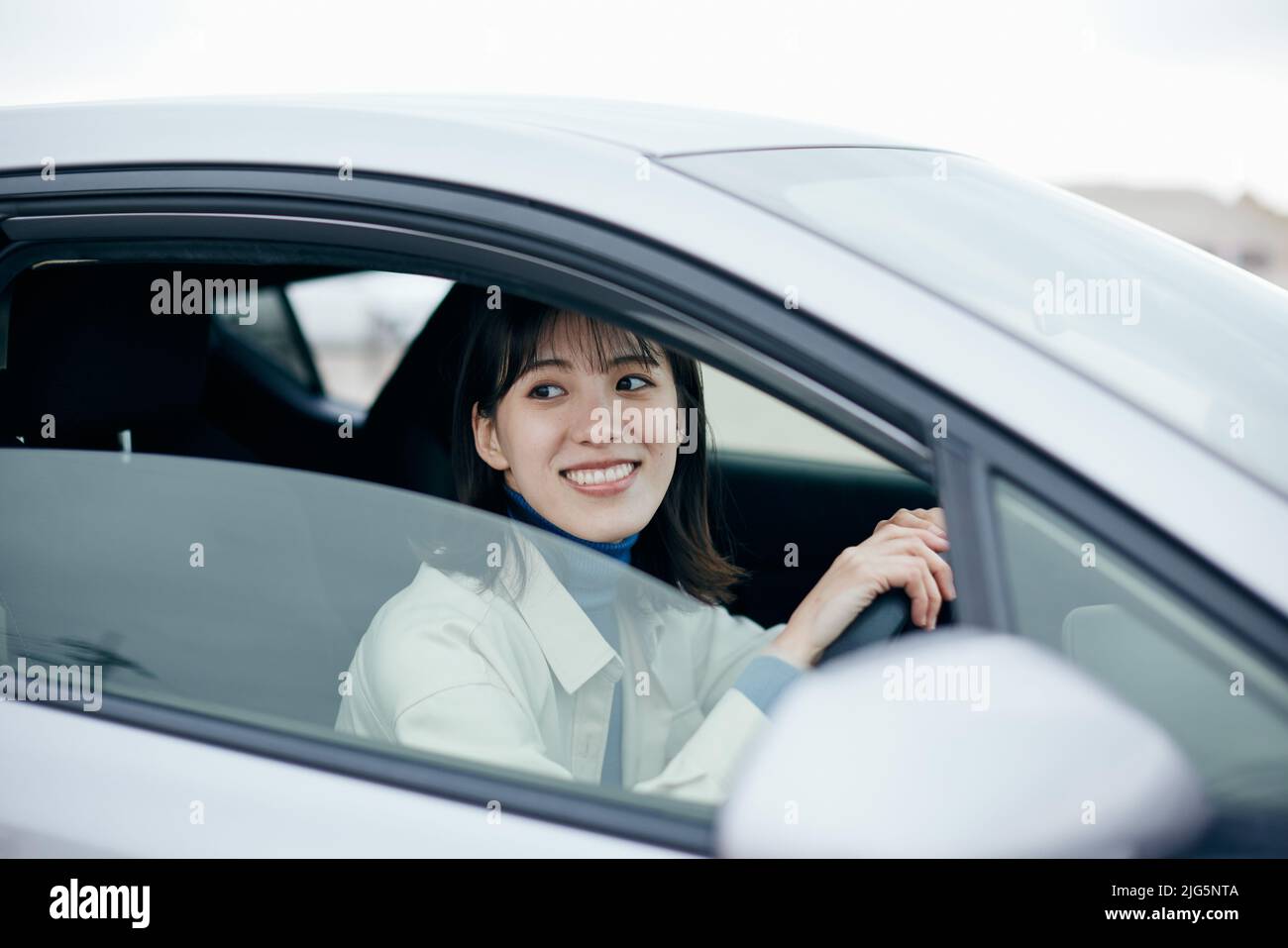 Japanese woman having a drive Stock Photo - Alamy